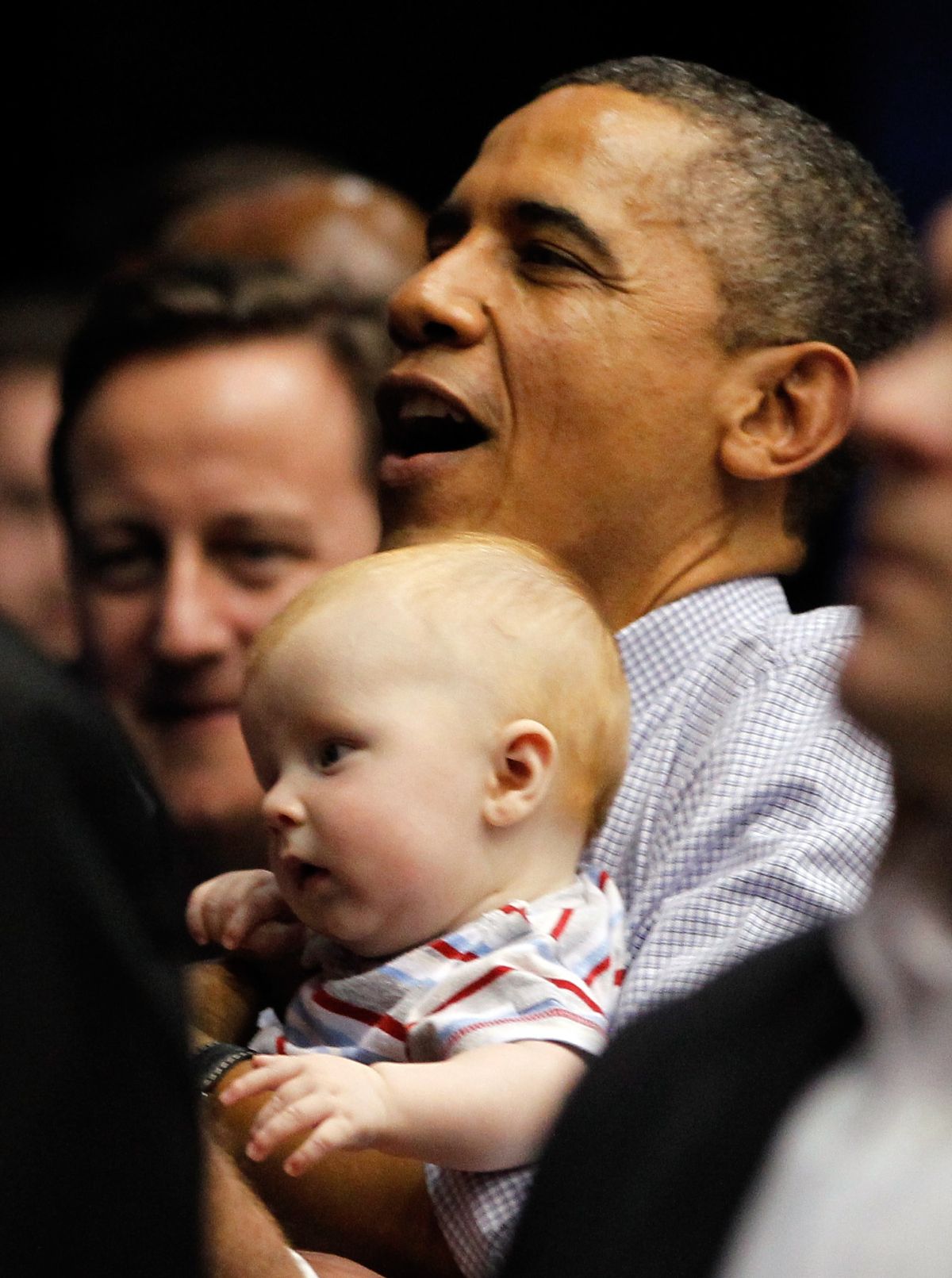 Barack Obama Holding Babies