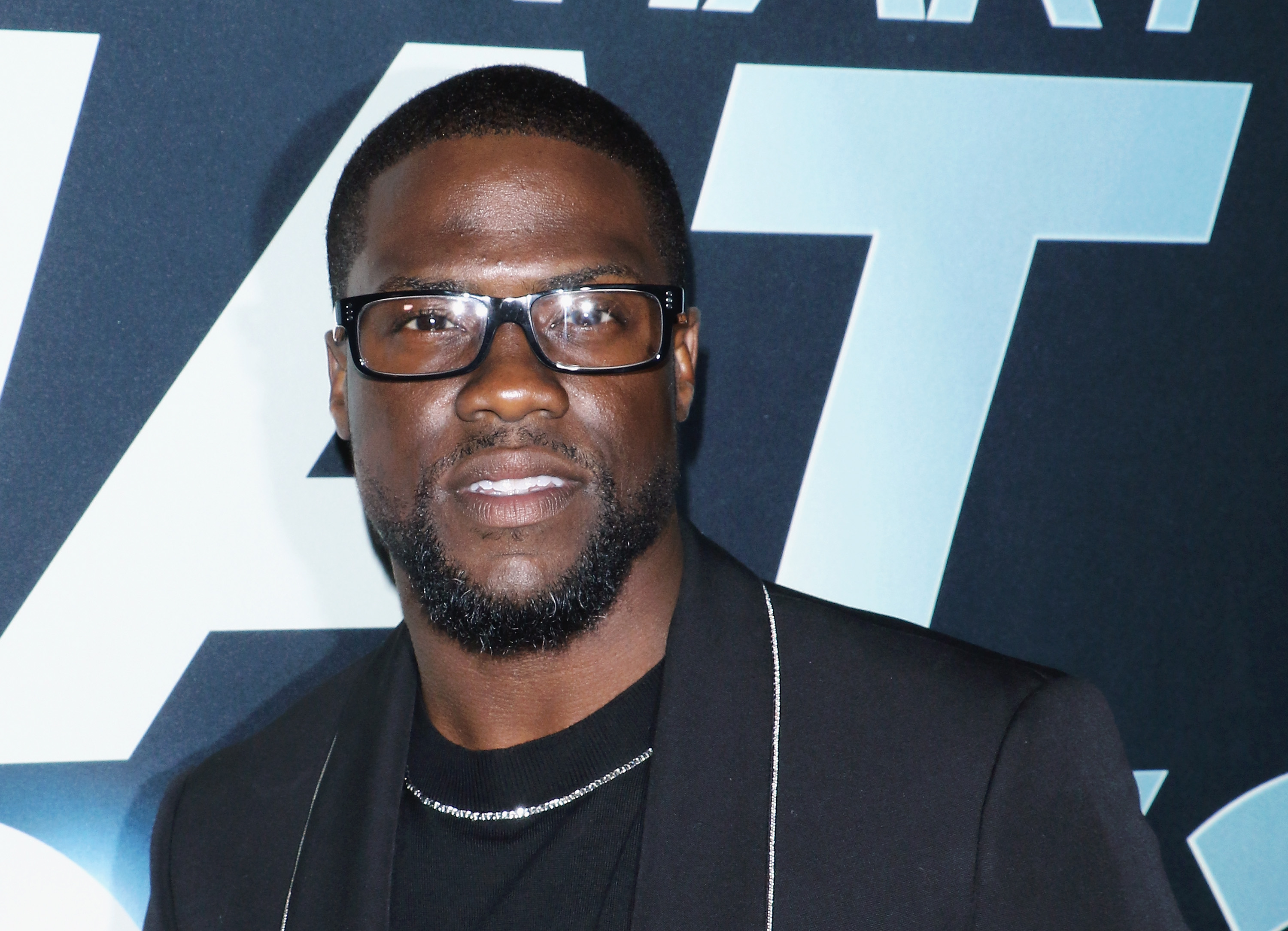 Kevin Hart Drunkenly Tries To Jump On Eagles Stage