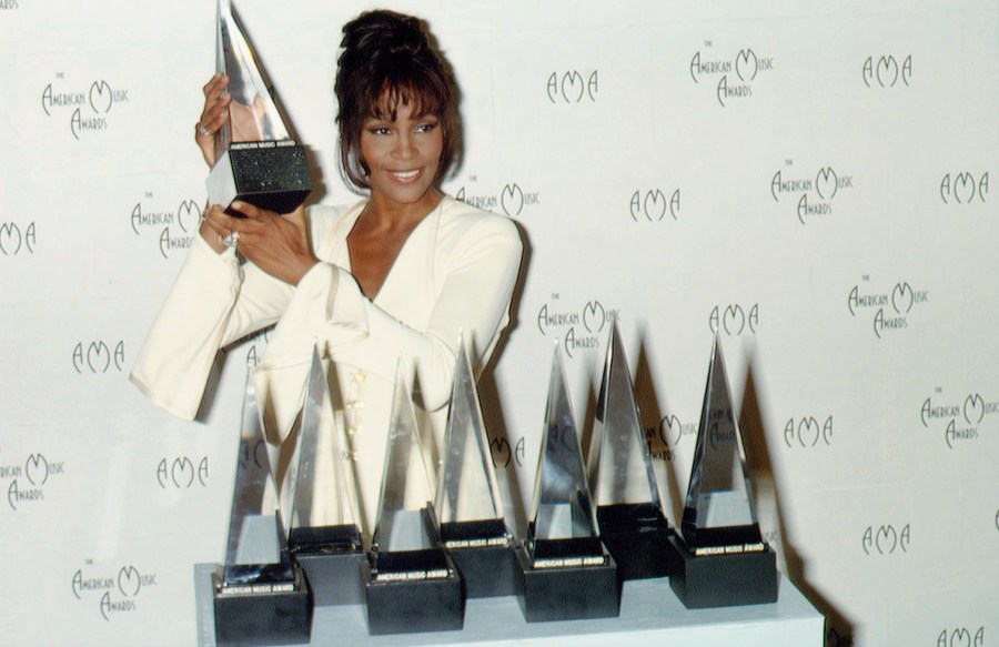 10 Of Whitney Houston's Most Iconic Fashion Moments